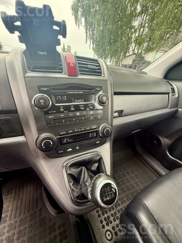 Grey Honda CR-V 2007 in Riga, with an engine capacity of 2.00 L and mileage of 0 thousand km for 3450 €, photo 9 on AUTOMOTO.COM.LV