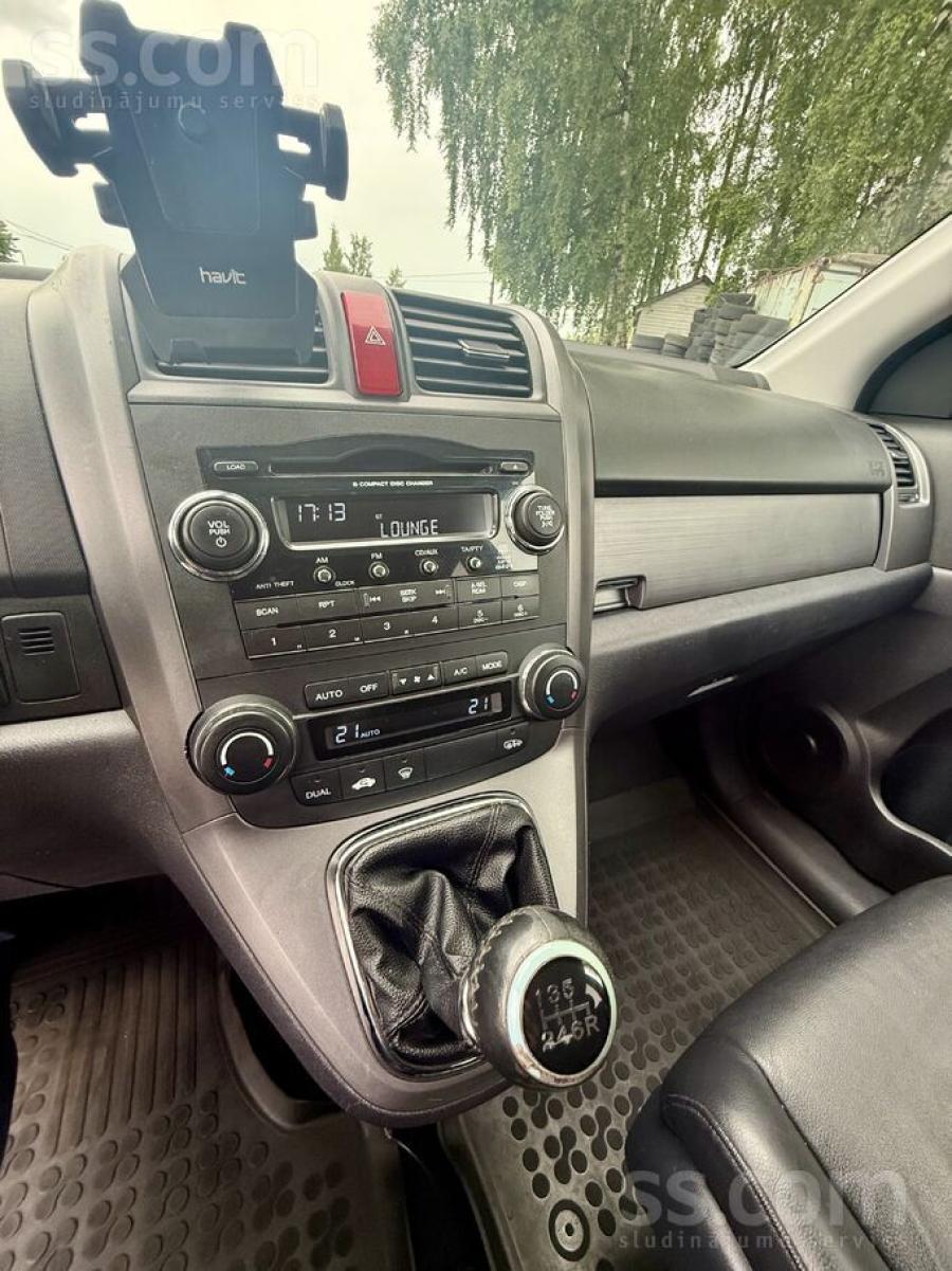 Grey Honda CR-V 2007 in Riga, with an engine capacity of 2.00 L and mileage of 0 thousand km for 3450 €, photo 10 on AUTOMOTO.COM.LV