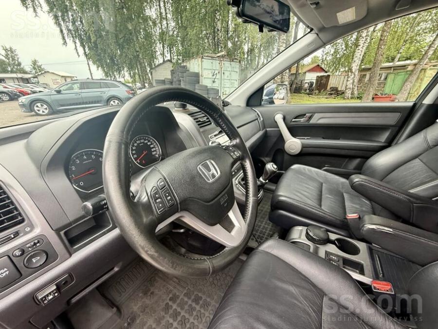 Grey Honda CR-V 2007 in Riga, with an engine capacity of 2.00 L and mileage of 0 thousand km for 3450 €, photo 13 on AUTOMOTO.COM.LV