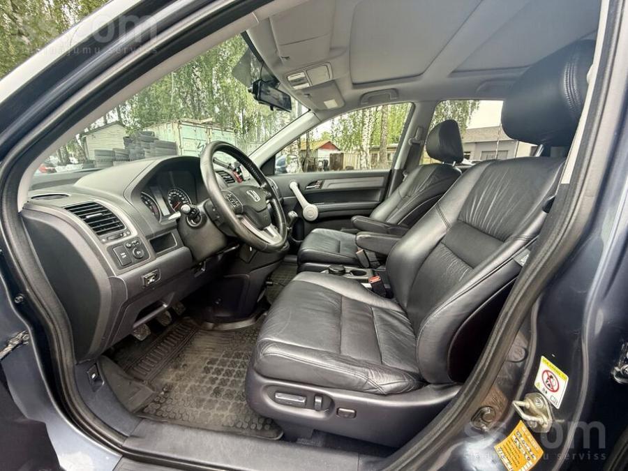 Grey Honda CR-V 2007 in Riga, with an engine capacity of 2.00 L and mileage of 0 thousand km for 3450 €, photo 14 on AUTOMOTO.COM.LV