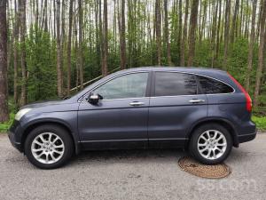 Pelēks Honda CR-V 2007 Rīga, ar dzinēja tilpumu 2.20 L un nobraukumu 303 tūkst. km par 3200 €, foto 3 vietnē AUTOMOTO.COM.LV