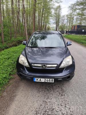 Pelēks Honda CR-V 2007 Rīga, ar dzinēja tilpumu 2.20 L un nobraukumu 303 tūkst. km par 3200 €, foto 5 vietnē AUTOMOTO.COM.LV
