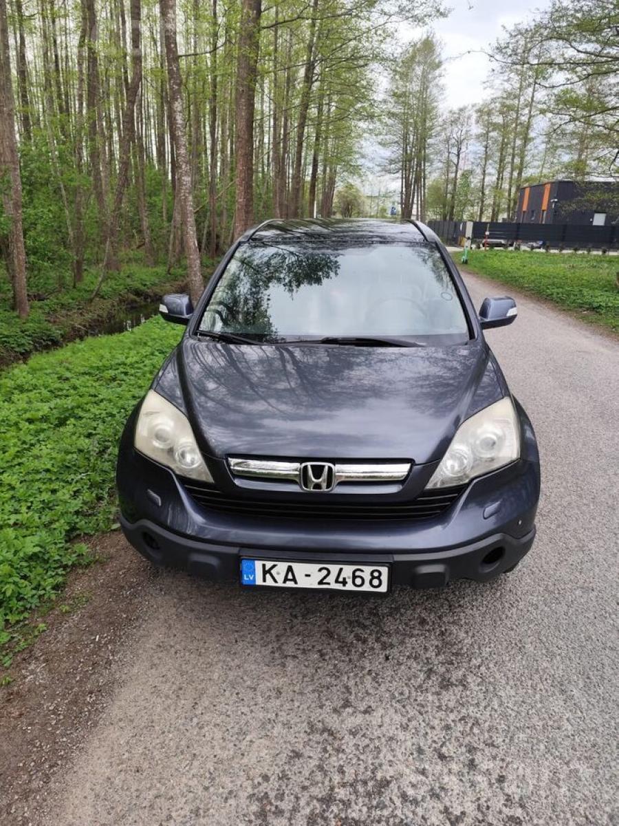 Pelēks Honda CR-V 2007 Rīga, ar dzinēja tilpumu 2.20 L un nobraukumu 303 tūkst. km par 3200 €, foto 5 vietnē AUTOMOTO.COM.LV