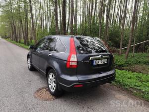 Pelēks Honda CR-V 2007 Rīga, ar dzinēja tilpumu 2.20 L un nobraukumu 303 tūkst. km par 3200 €, foto 6 vietnē AUTOMOTO.COM.LV