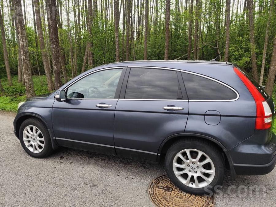 Pelēks Honda CR-V 2007 Rīga, ar dzinēja tilpumu 2.20 L un nobraukumu 303 tūkst. km par 3200 €, foto 8 vietnē AUTOMOTO.COM.LV
