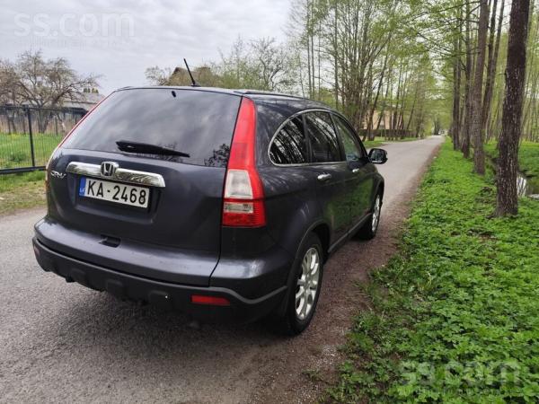 Grey Honda CR-V 2007 in Riga, with an engine capacity of 2.20 L and mileage of 303 thousand km for 3200 €, photo 9 on AUTOMOTO.COM.LV
