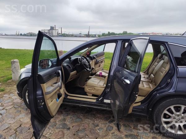 Grey Honda CR-V 2007 in Riga, with an engine capacity of 2.20 L and mileage of 303 thousand km for 3200 €, photo 10 on AUTOMOTO.COM.LV