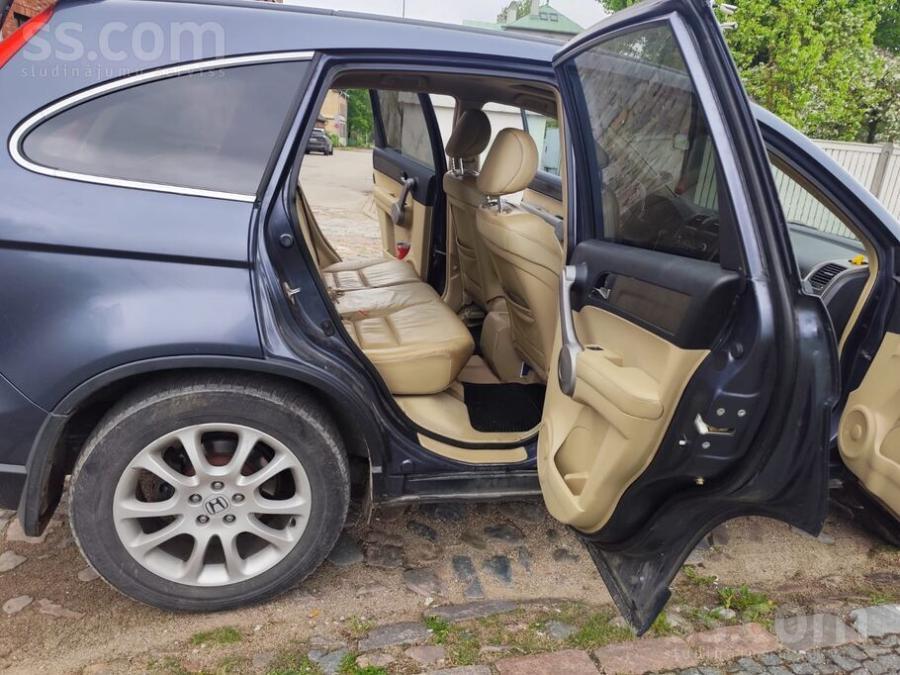Pelēks Honda CR-V 2007 Rīga, ar dzinēja tilpumu 2.20 L un nobraukumu 303 tūkst. km par 3200 €, foto 14 vietnē AUTOMOTO.COM.LV