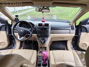 Pelēks Honda CR-V 2007 Rīga, ar dzinēja tilpumu 2.20 L un nobraukumu 303 tūkst. km par 3200 €, foto 15 vietnē AUTOMOTO.COM.LV