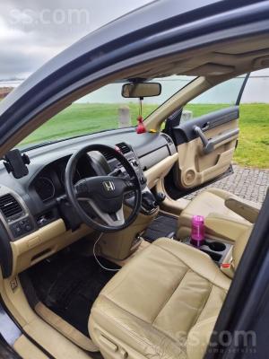 Pelēks Honda CR-V 2007 Rīga, ar dzinēja tilpumu 2.20 L un nobraukumu 303 tūkst. km par 3200 €, foto 17 vietnē AUTOMOTO.COM.LV