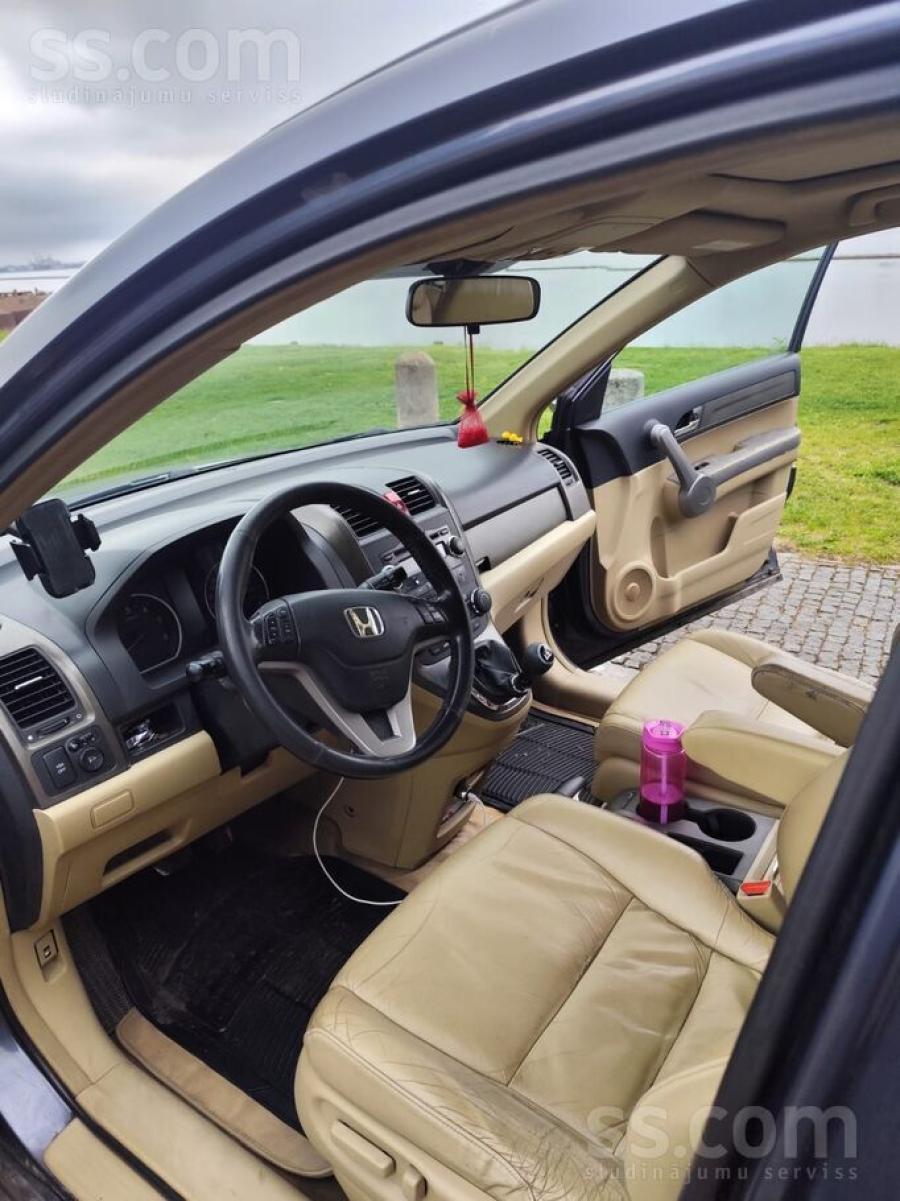 Pelēks Honda CR-V 2007 Rīga, ar dzinēja tilpumu 2.20 L un nobraukumu 303 tūkst. km par 3200 €, foto 17 vietnē AUTOMOTO.COM.LV