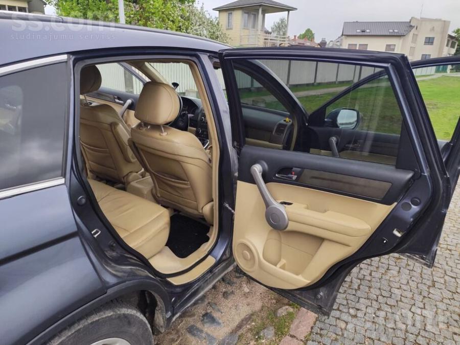Pelēks Honda CR-V 2007 Rīga, ar dzinēja tilpumu 2.20 L un nobraukumu 303 tūkst. km par 3200 €, foto 19 vietnē AUTOMOTO.COM.LV