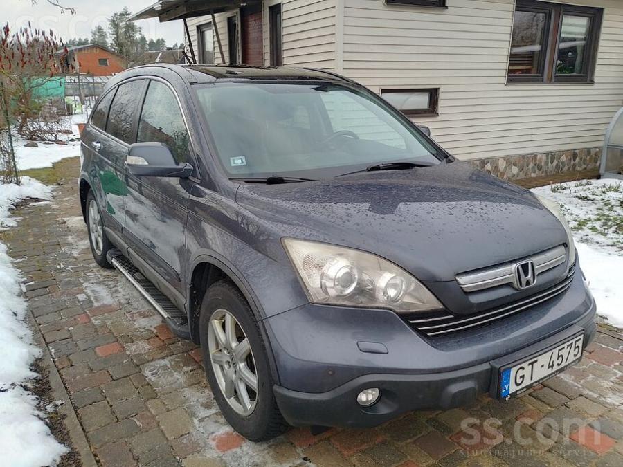 Pelēks Honda CR-V 2007 Rīga, ar dzinēja tilpumu 2.00 L un nobraukumu 398 tūkst. km par 3900 €, foto 1 vietnē AUTOMOTO.COM.LV