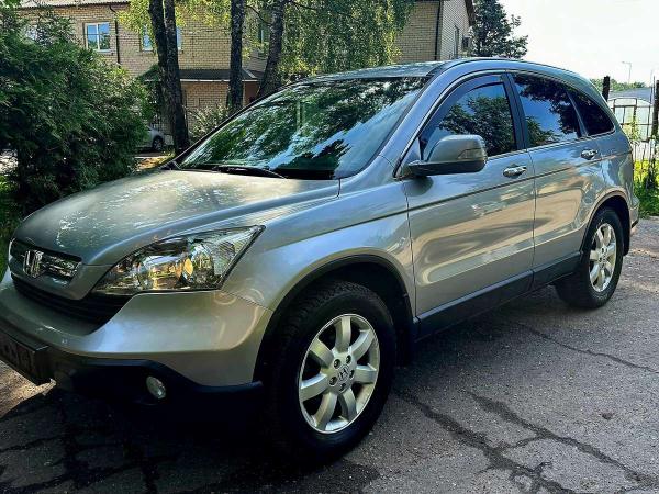 Grey Honda CR-V 2007 in Utena, with an engine capacity of 2.20 L and mileage of 286 thousand km for 6250 €, photo 6 on AUTOMOTO.COM.LV