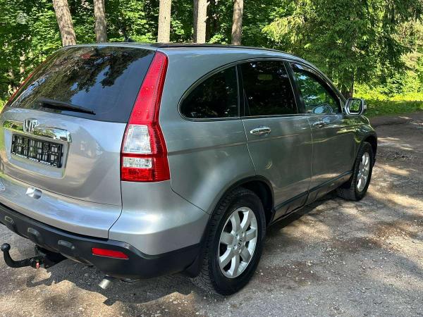 Grey Honda CR-V 2007 in Utena, with an engine capacity of 2.20 L and mileage of 286 thousand km for 6250 €, photo 8 on AUTOMOTO.COM.LV