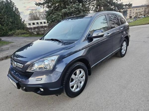 Pelēks Honda CR-V 2007 Jēkabpils, ar dzinēja tilpumu 2.20 L un nobraukumu 252 tūkst. km par 5890 €, foto 1 vietnē AUTOMOTO.COM.LV