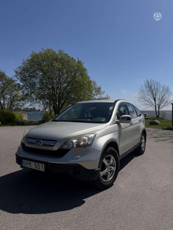 Grey Honda CR-V 2007 in Kaunas, with an engine capacity of 2.20 L and mileage of 325 thousand km for 2600 €, photo 1 on AUTOMOTO.COM.LV