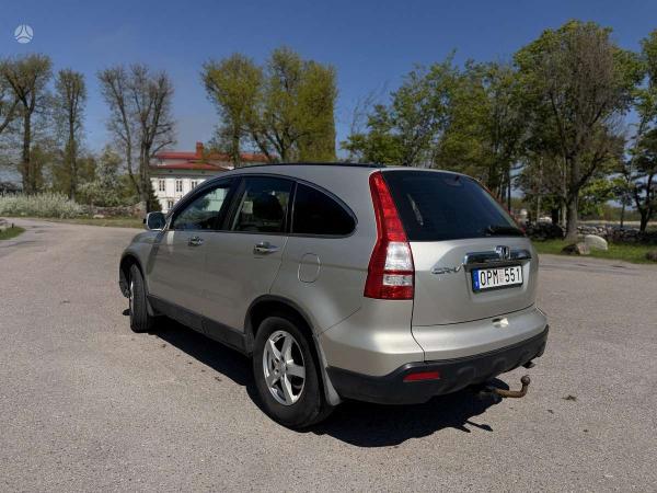 Grey Honda CR-V 2007 in Kaunas, with an engine capacity of 2.20 L and mileage of 325 thousand km for 2600 €, photo 5 on AUTOMOTO.COM.LV