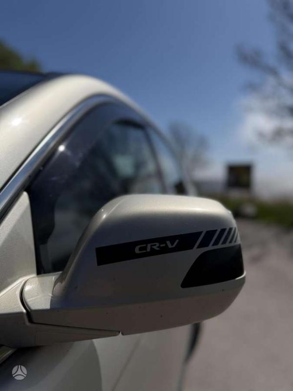 Grey Honda CR-V 2007 in Kaunas, with an engine capacity of 2.20 L and mileage of 325 thousand km for 2600 €, photo 6 on AUTOMOTO.COM.LV