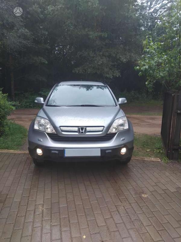 Grey Honda CR-V 2007 in Vilnius, with an engine capacity of 2.20 L and mileage of 282 thousand km for 3850 €, photo 1 on AUTOMOTO.COM.LV