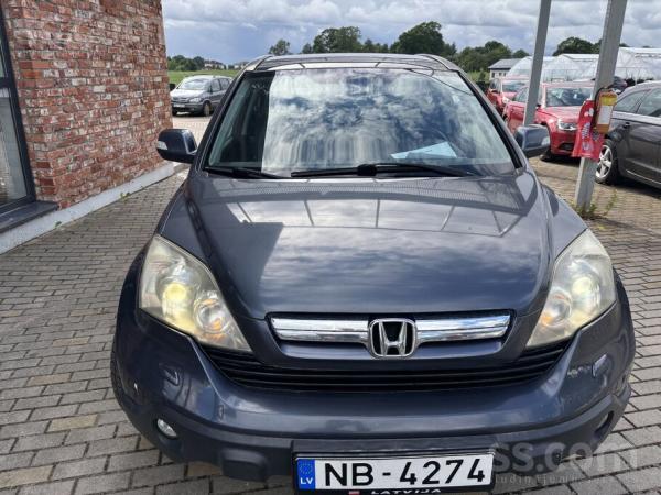 Grey Honda CR-V 2007 in Talsi, with an engine capacity of 2.20 L and mileage of 0 thousand km for 4970 €, photo 6 on AUTOMOTO.COM.LV