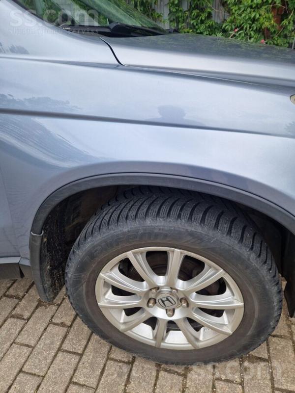 Grey Honda CR-V 2007 in Valmiera, with an engine capacity of 2.00 L and mileage of 320 thousand km for 3500 €, photo 8 on AUTOMOTO.COM.LV