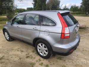 Grey Honda CR-V 2007 in Riga, with an engine capacity of 2.00 L and mileage of 197 thousand km for 4900 €, photo 3 on AUTOMOTO.COM.LV