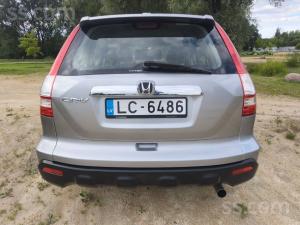 Grey Honda CR-V 2007 in Riga, with an engine capacity of 2.00 L and mileage of 197 thousand km for 4900 €, photo 4 on AUTOMOTO.COM.LV
