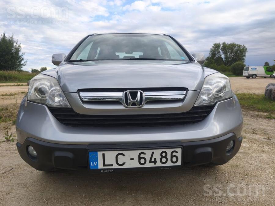 Grey Honda CR-V 2007 in Riga, with an engine capacity of 2.00 L and mileage of 197 thousand km for 4900 €, photo 7 on AUTOMOTO.COM.LV