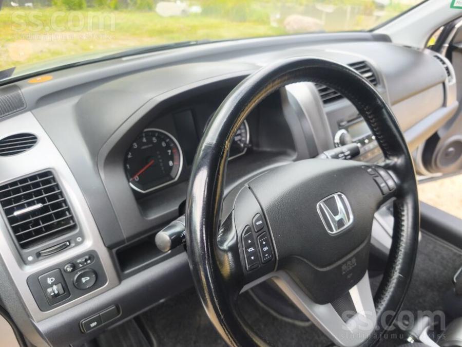Grey Honda CR-V 2007 in Riga, with an engine capacity of 2.00 L and mileage of 197 thousand km for 4900 €, photo 11 on AUTOMOTO.COM.LV