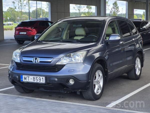Grey Honda CR-V 2007 in Riga, with an engine capacity of 2.00 L and mileage of 300 thousand km for 3200 €, photo 1 on AUTOMOTO.COM.LV