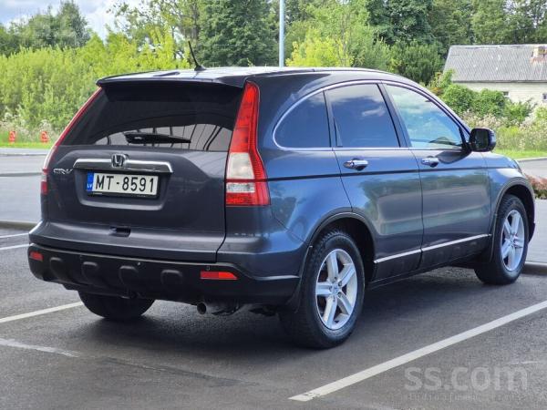 Grey Honda CR-V 2007 in Riga, with an engine capacity of 2.00 L and mileage of 300 thousand km for 3200 €, photo 4 on AUTOMOTO.COM.LV