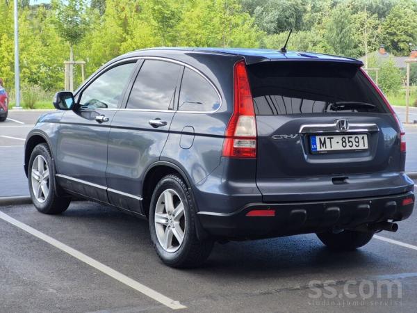 Grey Honda CR-V 2007 in Riga, with an engine capacity of 2.00 L and mileage of 300 thousand km for 3200 €, photo 5 on AUTOMOTO.COM.LV