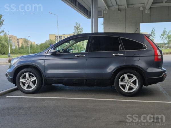 Grey Honda CR-V 2007 in Riga, with an engine capacity of 2.00 L and mileage of 300 thousand km for 3200 €, photo 6 on AUTOMOTO.COM.LV