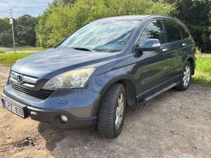 Grey Honda CR-V 2007 in Vilnius, with an engine capacity of 2.00 L and mileage of 269 thousand km for 2400 €, photo 3 on AUTOMOTO.COM.LV