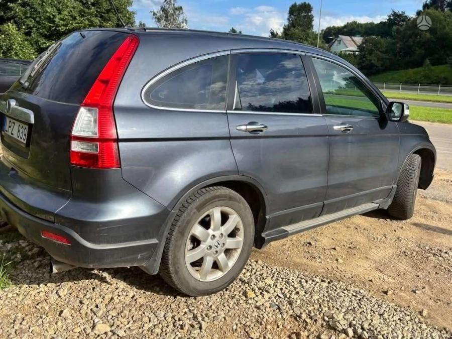 Grey Honda CR-V 2007 in Vilnius, with an engine capacity of 2.00 L and mileage of 269 thousand km for 2400 €, photo 6 on AUTOMOTO.COM.LV