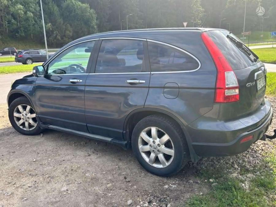 Grey Honda CR-V 2007 in Vilnius, with an engine capacity of 2.00 L and mileage of 269 thousand km for 2400 €, photo 7 on AUTOMOTO.COM.LV