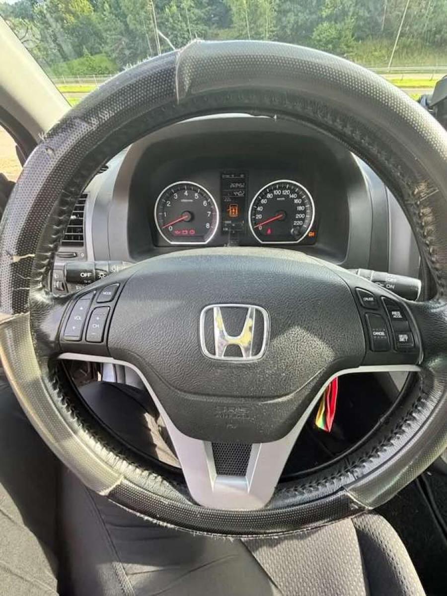 Grey Honda CR-V 2007 in Vilnius, with an engine capacity of 2.00 L and mileage of 269 thousand km for 2400 €, photo 8 on AUTOMOTO.COM.LV