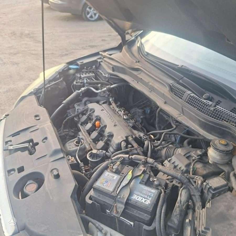 Grey Honda CR-V 2007 in Vilnius, with an engine capacity of 2.00 L and mileage of 269 thousand km for 2400 €, photo 12 on AUTOMOTO.COM.LV