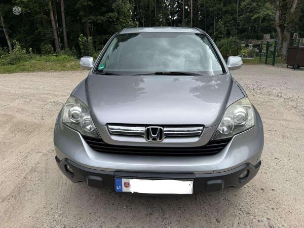 Grey Honda CR-V 2007 in Kaunas, with an engine capacity of 2.20 L and mileage of 251 thousand km for 3800 €, photo 4 on AUTOMOTO.COM.LV
