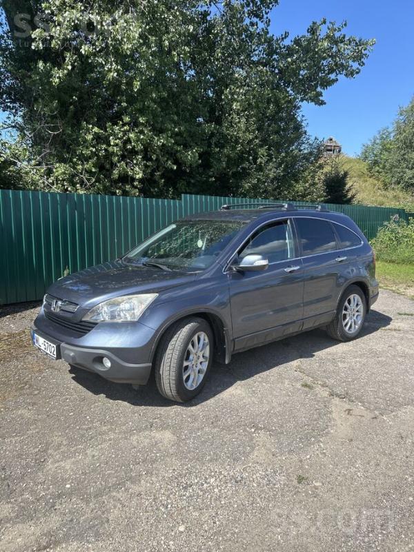 Pelēks Honda CR-V 2007 Daugavpils, ar dzinēja tilpumu 2.20 L un nobraukumu 251 tūkst. km par 4150 €, foto 2 vietnē AUTOMOTO.COM.LV