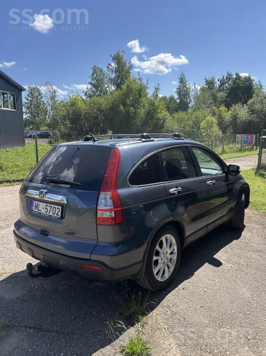 Pelēks Honda CR-V 2007 Daugavpils, ar dzinēja tilpumu 2.20 L un nobraukumu 251 tūkst. km par 4150 €, foto 5 vietnē AUTOMOTO.COM.LV