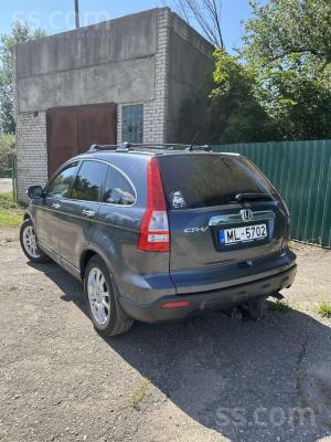 Pelēks Honda CR-V 2007 Daugavpils, ar dzinēja tilpumu 2.20 L un nobraukumu 251 tūkst. km par 4150 €, foto 6 vietnē AUTOMOTO.COM.LV