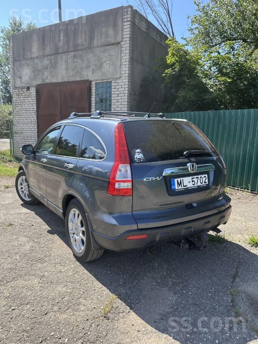 Pelēks Honda CR-V 2007 Daugavpils, ar dzinēja tilpumu 2.20 L un nobraukumu 251 tūkst. km par 4150 €, foto 6 vietnē AUTOMOTO.COM.LV