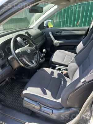 Pelēks Honda CR-V 2007 Daugavpils, ar dzinēja tilpumu 2.20 L un nobraukumu 251 tūkst. km par 4150 €, foto 9 vietnē AUTOMOTO.COM.LV