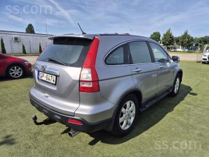 Grey Honda CR-V 2007 in Liepaja, with an engine capacity of 2.00 L and mileage of 167 thousand km for 5000 €, photo 6 on AUTOMOTO.COM.LV