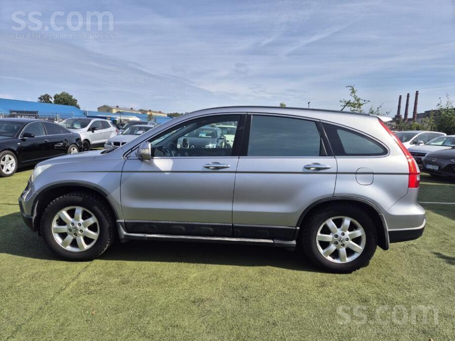 Grey Honda CR-V 2007 in Liepaja, with an engine capacity of 2.00 L and mileage of 167 thousand km for 5000 €, photo 9 on AUTOMOTO.COM.LV