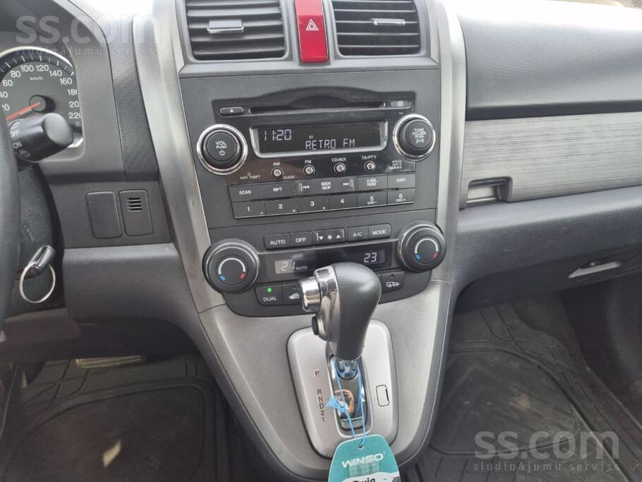 Grey Honda CR-V 2007 in Liepaja, with an engine capacity of 2.00 L and mileage of 167 thousand km for 5000 €, photo 12 on AUTOMOTO.COM.LV