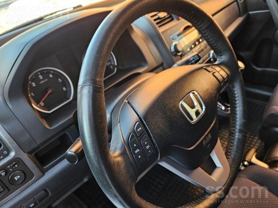Grey Honda CR-V 2007 in Riga, with an engine capacity of 2.00 L and mileage of 0 thousand km for 2590 €, photo 12 on AUTOMOTO.COM.LV