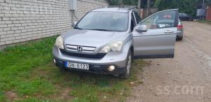 Pelēks Honda CR-V 2007 Rīga, ar dzinēja tilpumu 2.00 L un nobraukumu 292 tūkst. km par 2700 €, foto  vietnē AUTOMOTO.COM.LV